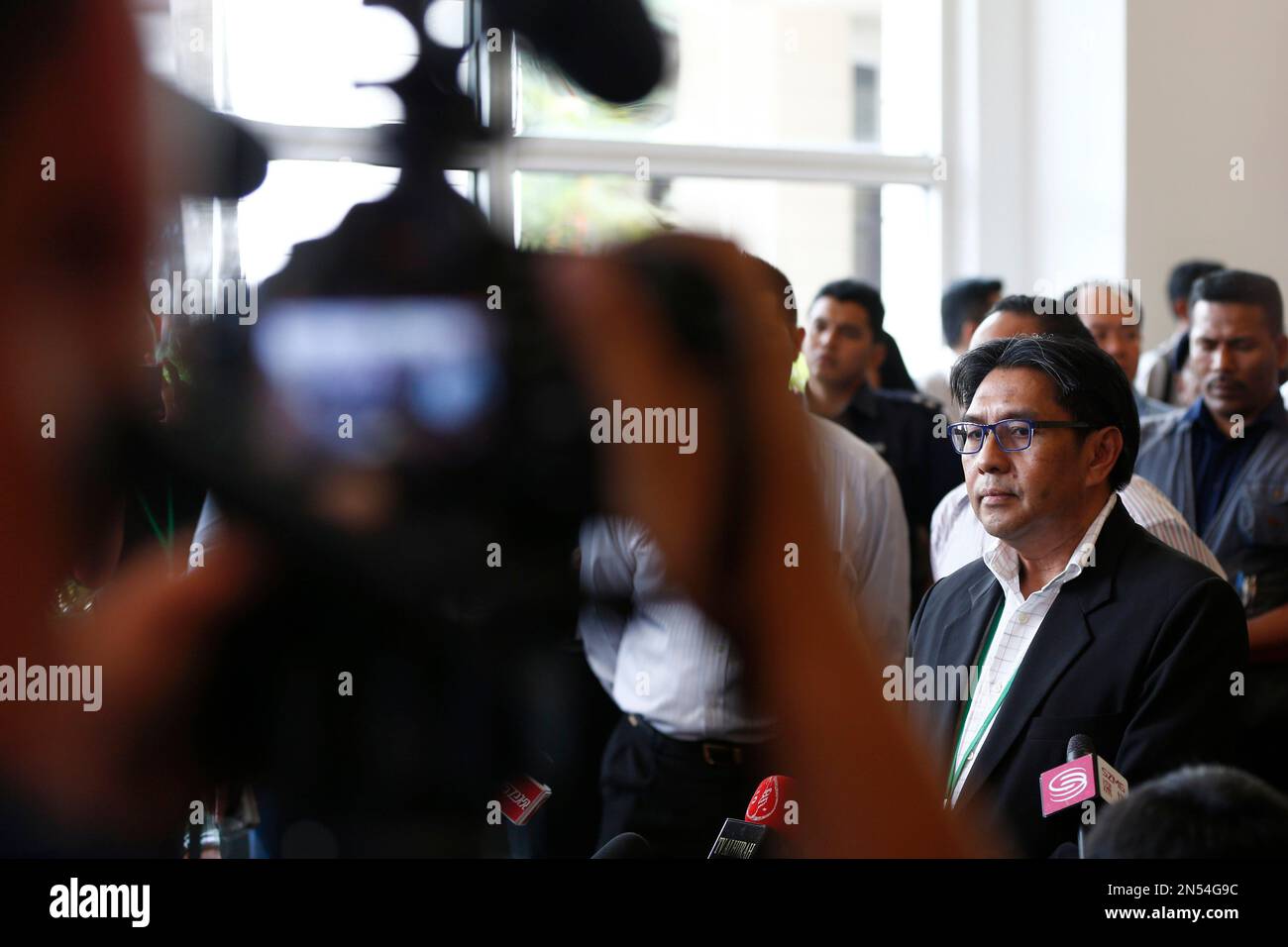 Malaysian Department of Civil Aviation, Azharuddin Abdul Rahman, right ...