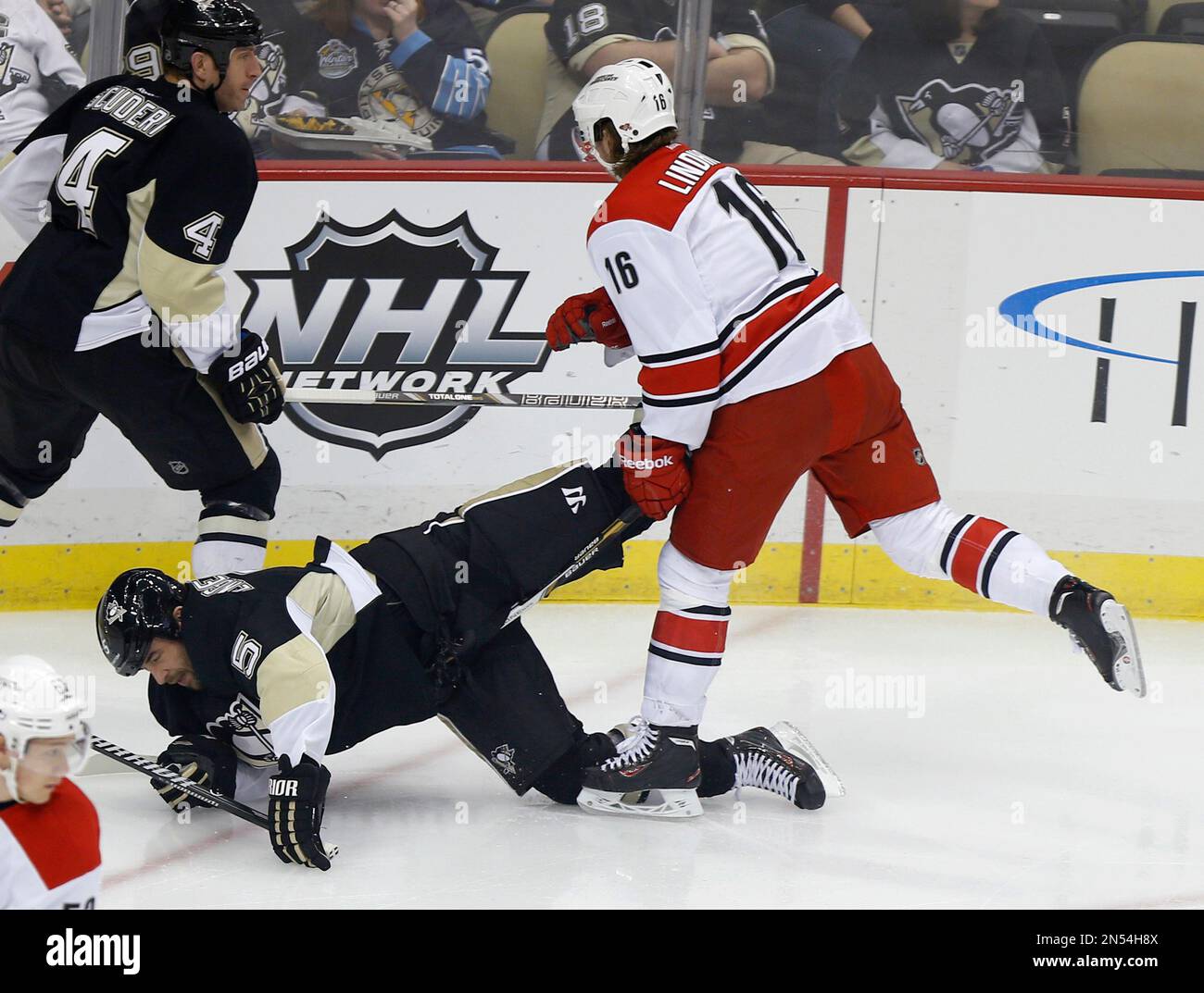 Pittsburgh Penguins' Deryk Engelland (5) is upended by Carolina ...