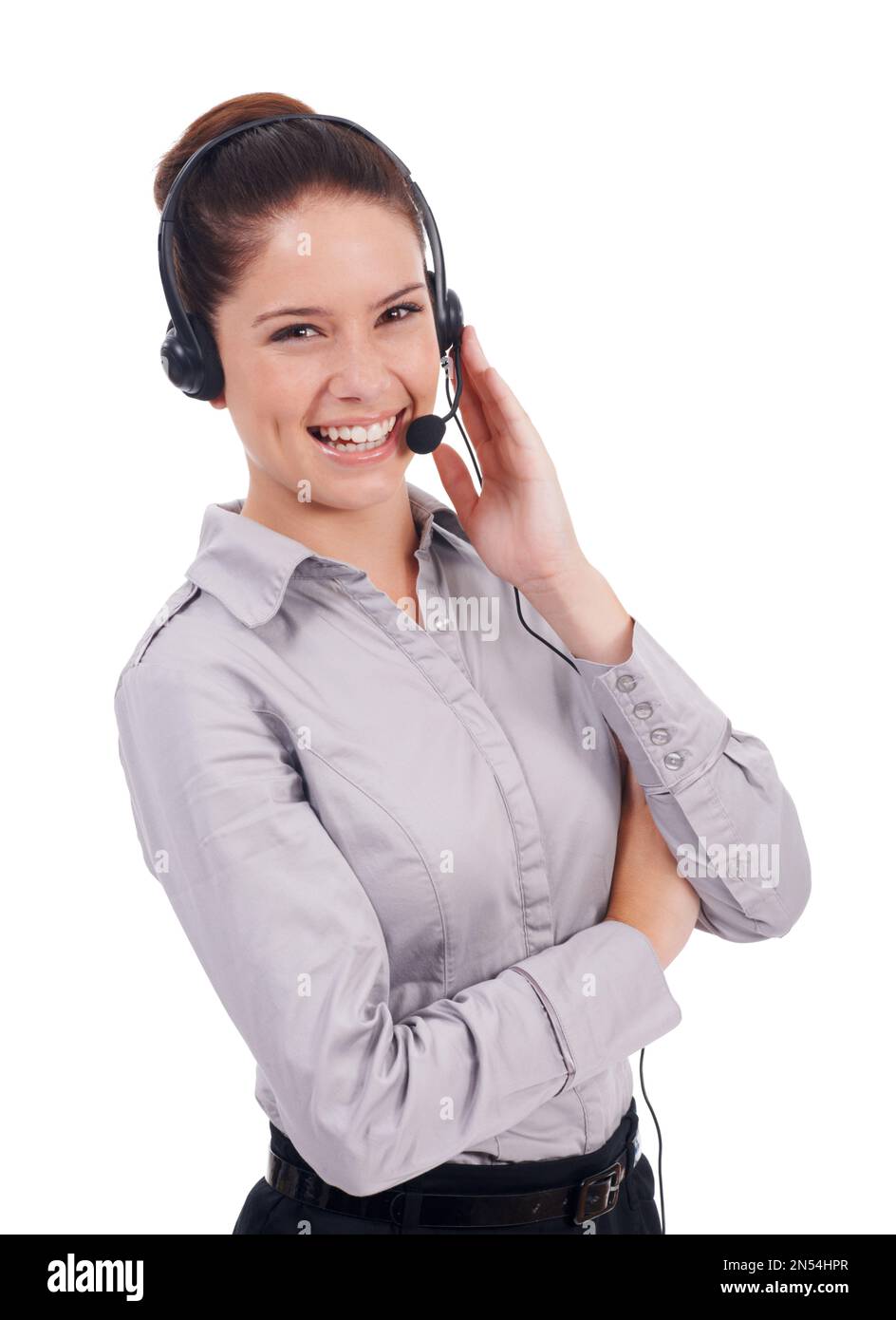 Positive customer rep. a young customer service representative wearing a headset and laughing ...