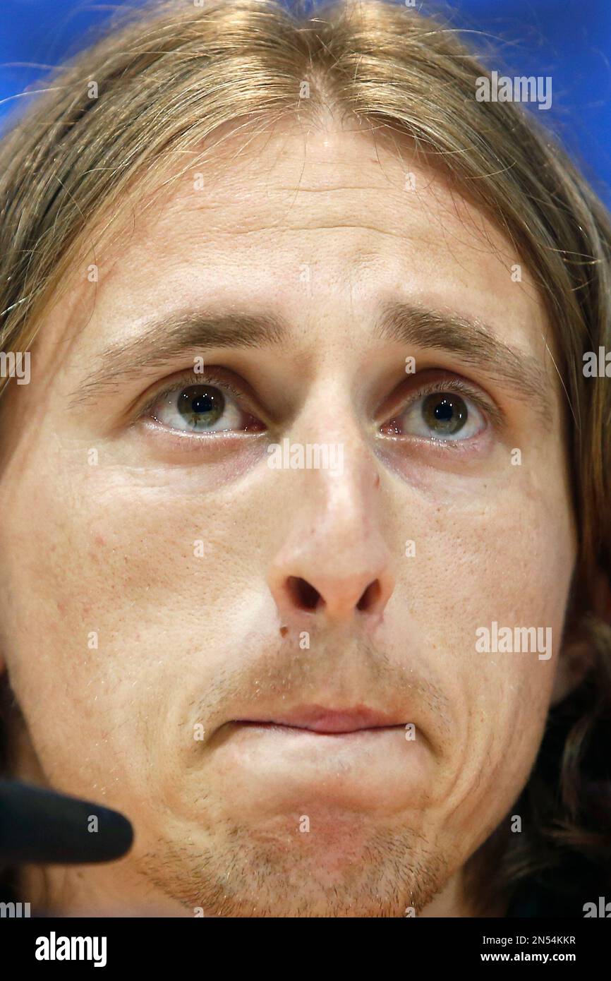 Real's Luka Modric listens to a question during a press conference in ...