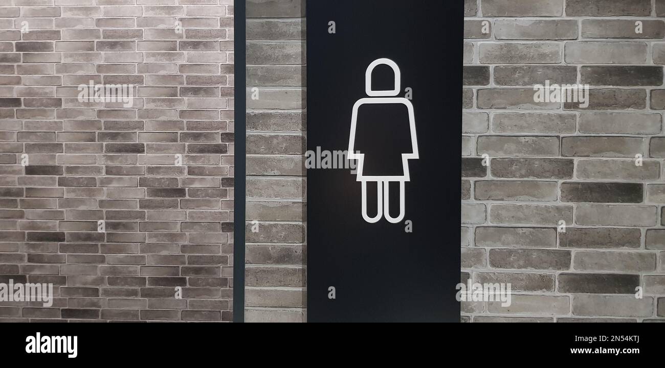 A toilet sign of women on door Stock Photo - Alamy