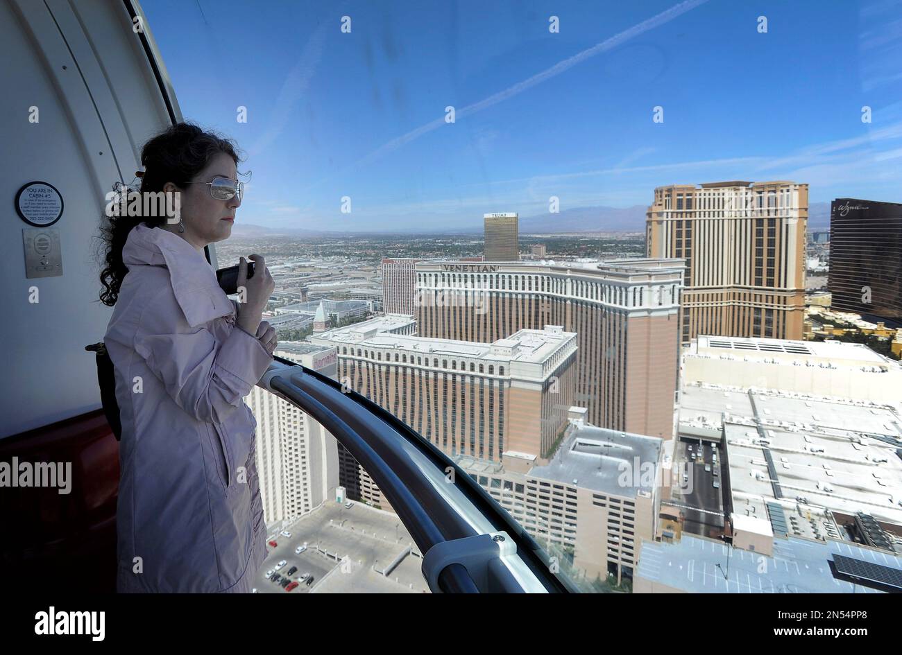 Jen Chase looks out from one of the cabins as she rides the Las Vegas ...