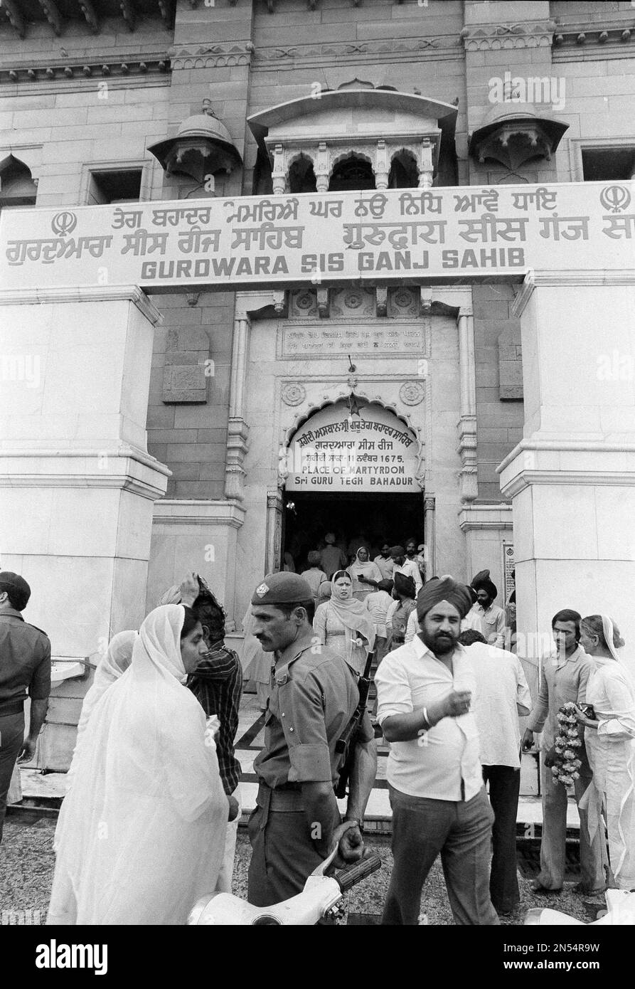 An Indian soldier is in front of a Sikh temple in Delhi, Nov. 8, 1984 ...