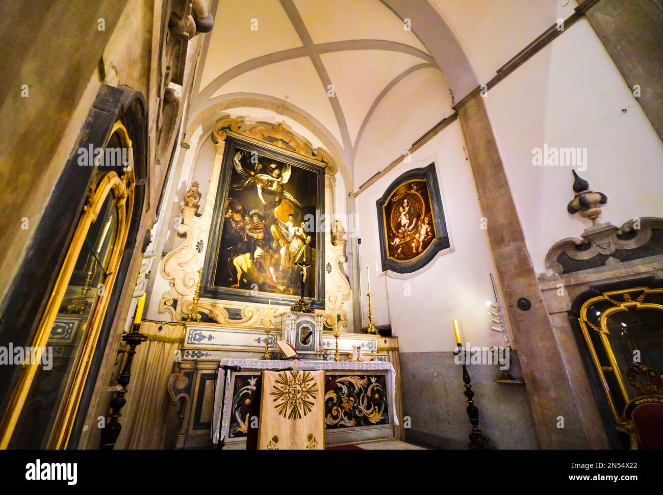 A view of Caravaggio's famous painting, The Seven Works of Mercy. At ...