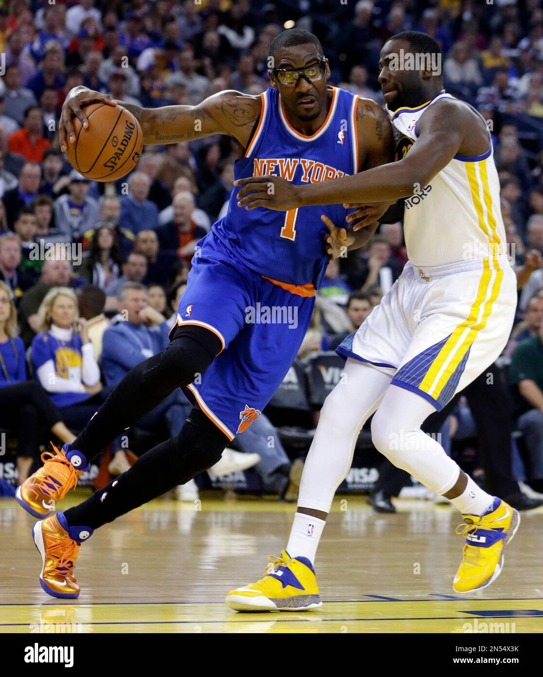 New York Knicks' Amar'e Stoudemire, left, drives the ball against ...