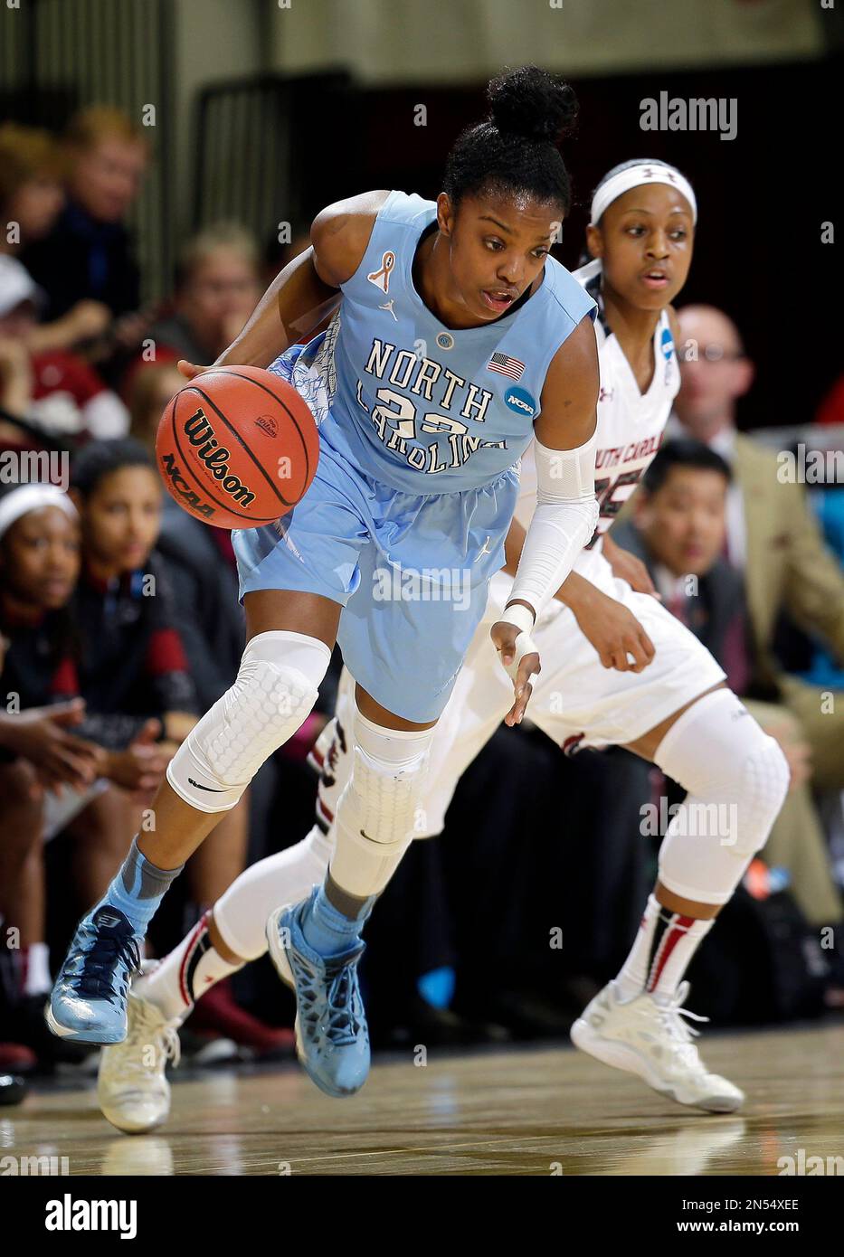North Carolina guard Diamond DeShields, left, dribbles around South ...