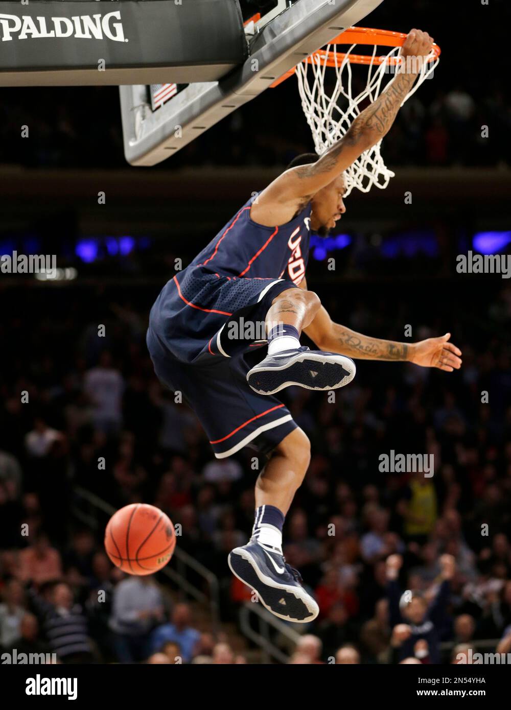 Connecticut's Ryan Boatright dunks the ball in the first half of a ...