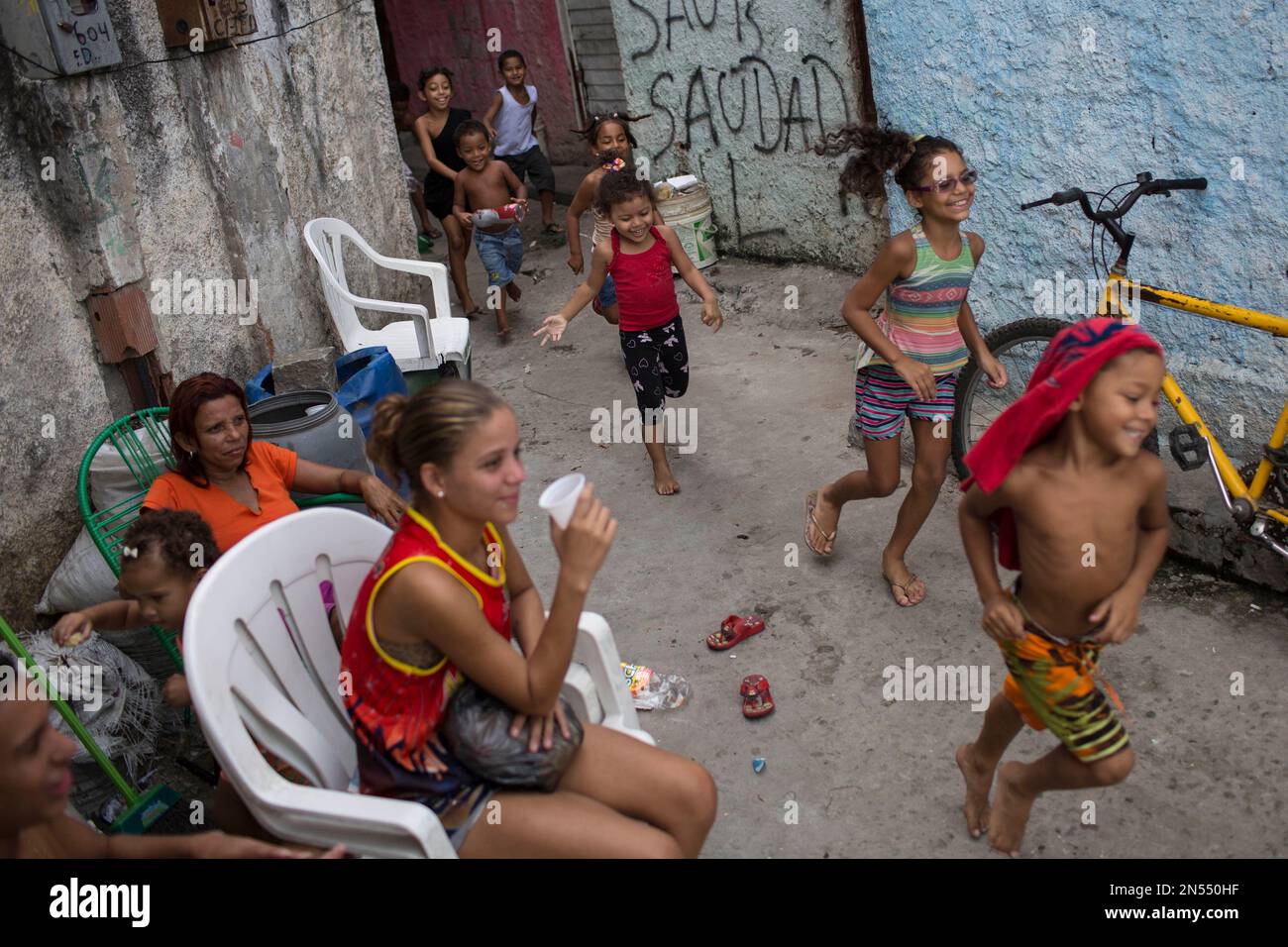 Young residents play in an alley after a police operation at Nova ...
