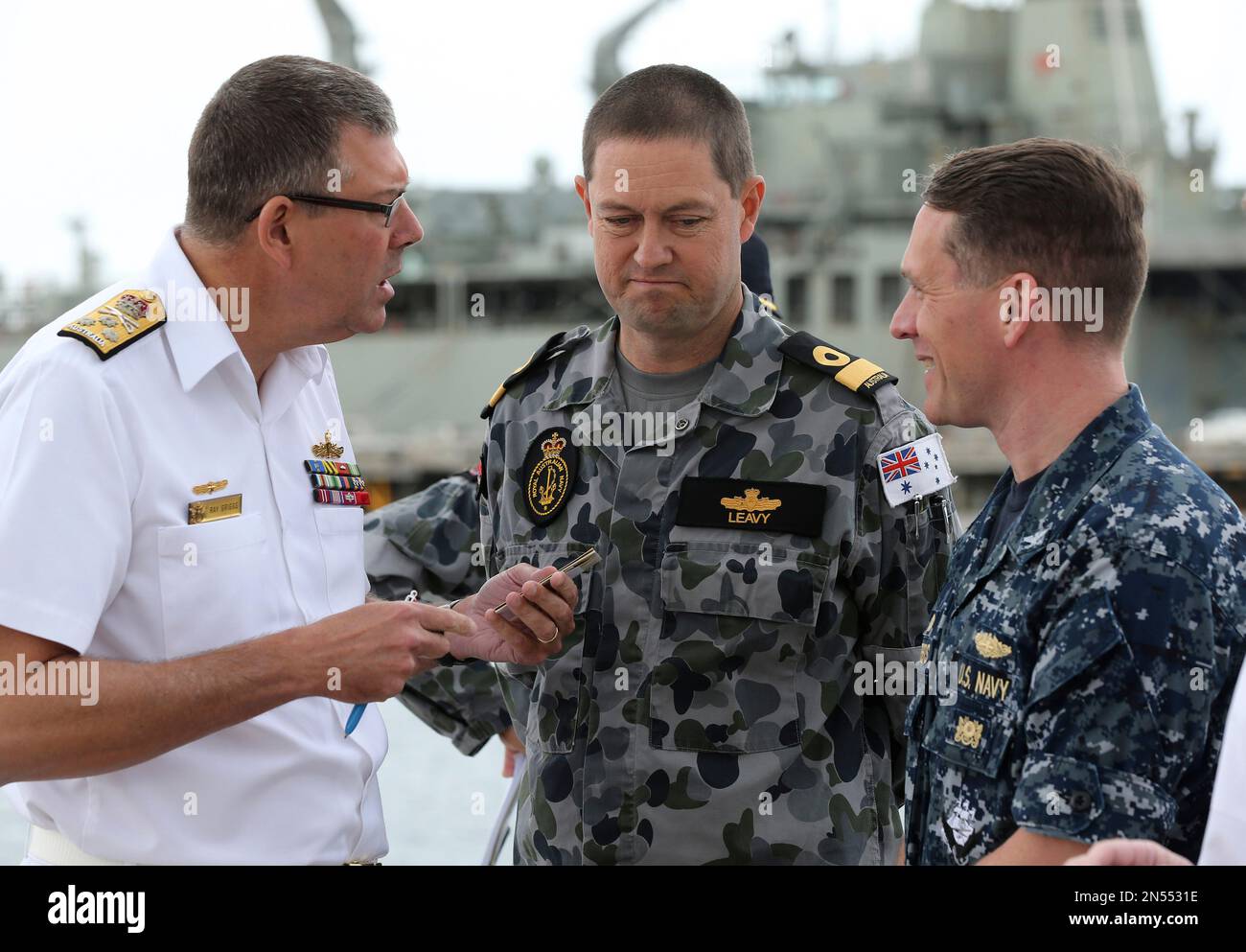 U.S. Navy captain Mark Matthews, right, Royal Australian Navy commodore ...