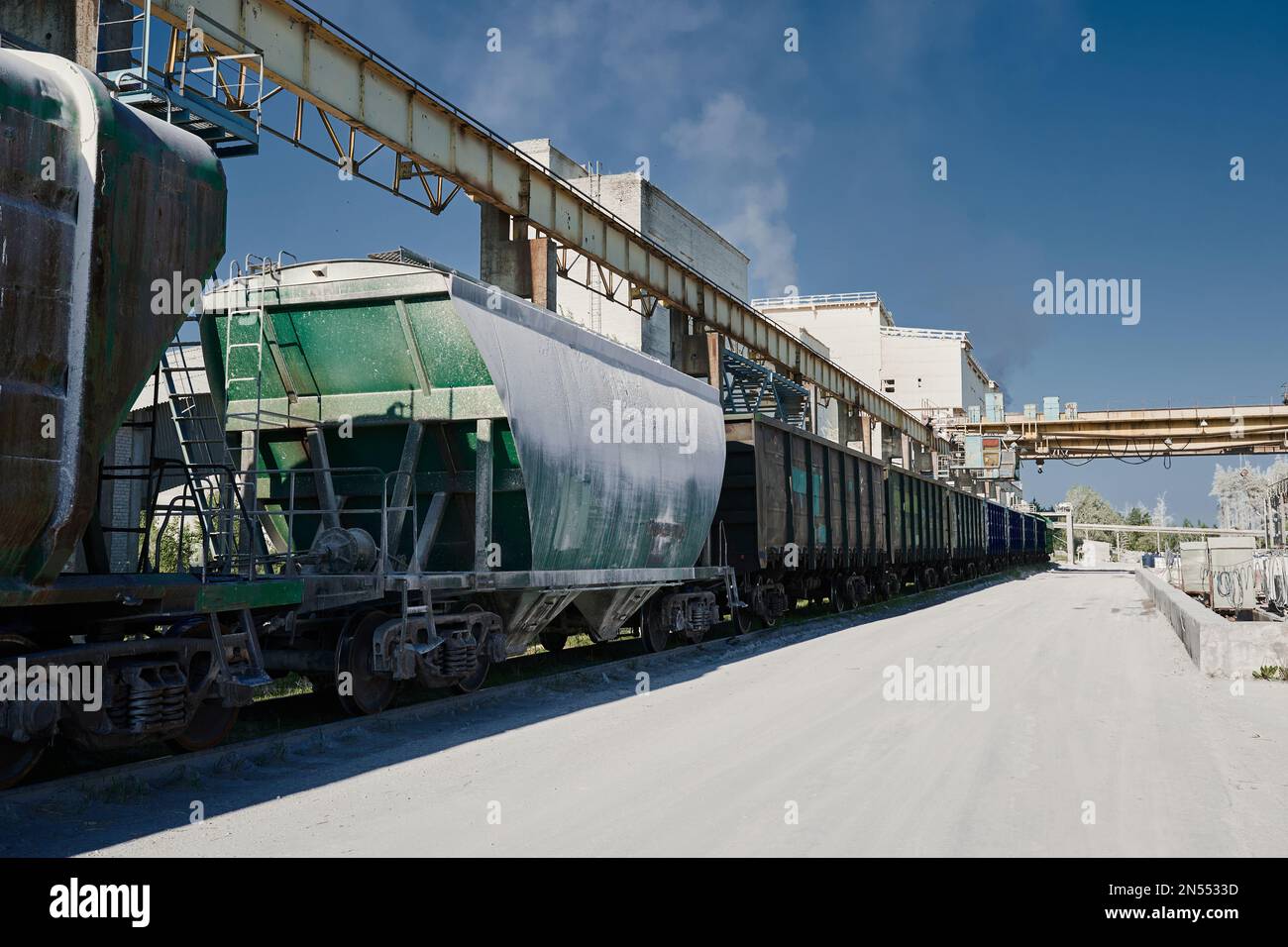 Cargo train prepared for loading at lime production plant Stock Photo ...