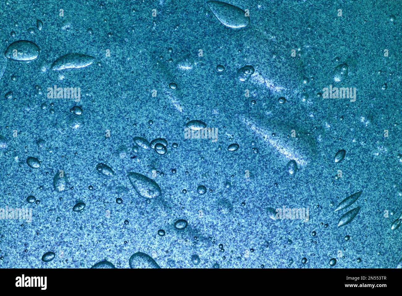 Bubbles in blue liquid gel, cosmetic product, backdrop Stock Photo - Alamy