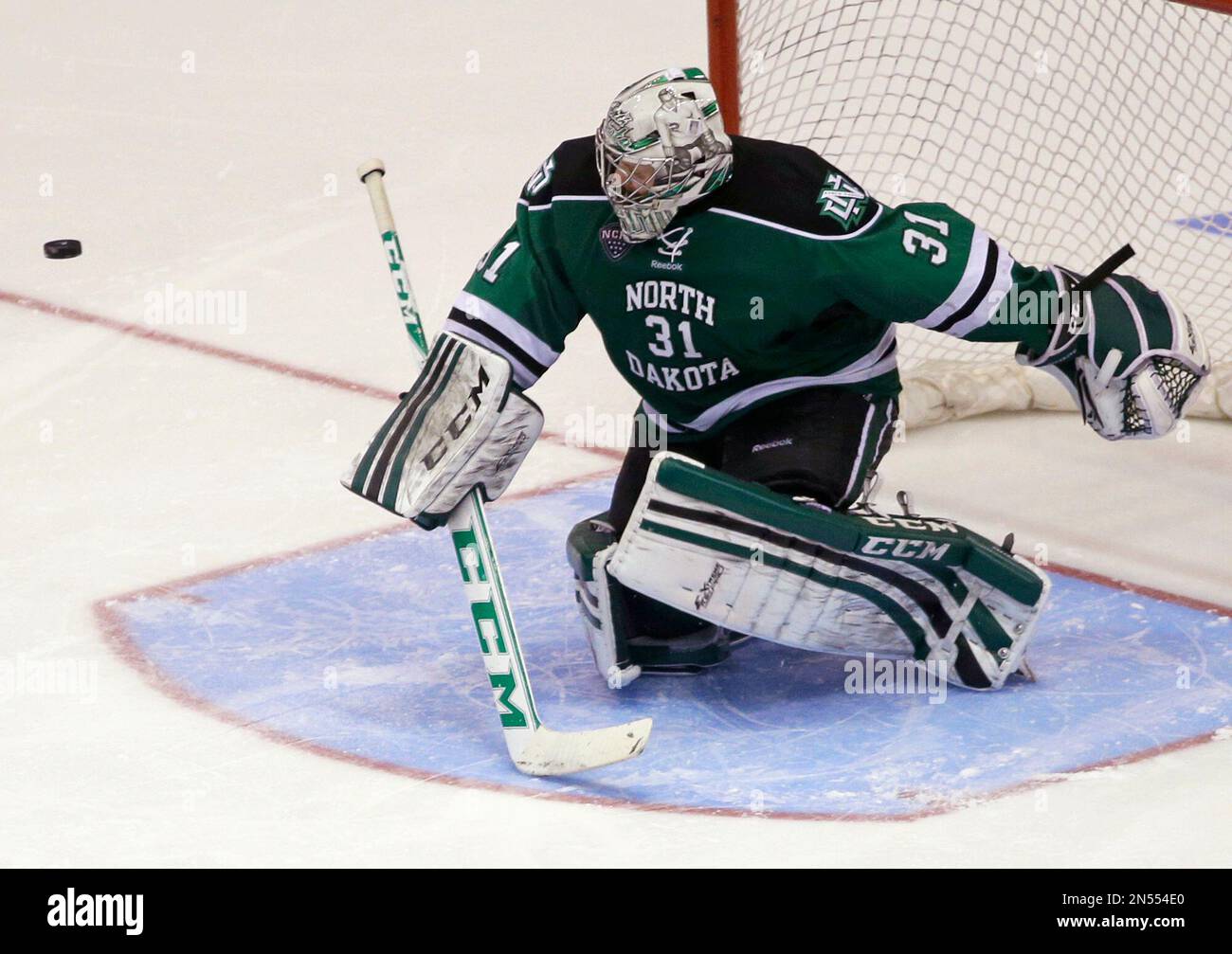 North Dakota goalie Zane Gothberg makes a save against Ferris State in ...