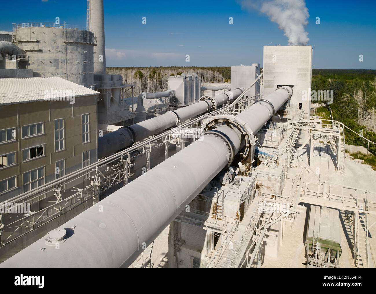 Lime burning kiln with rising steam at production plant Stock Photo - Alamy