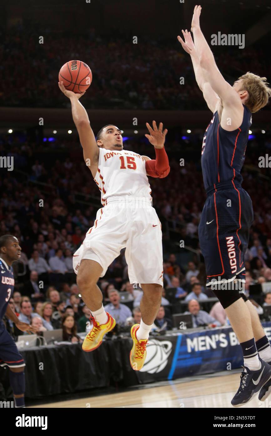 Iowa State's Naz Long (15) shoots over Connecticut's Niels Giffey ...
