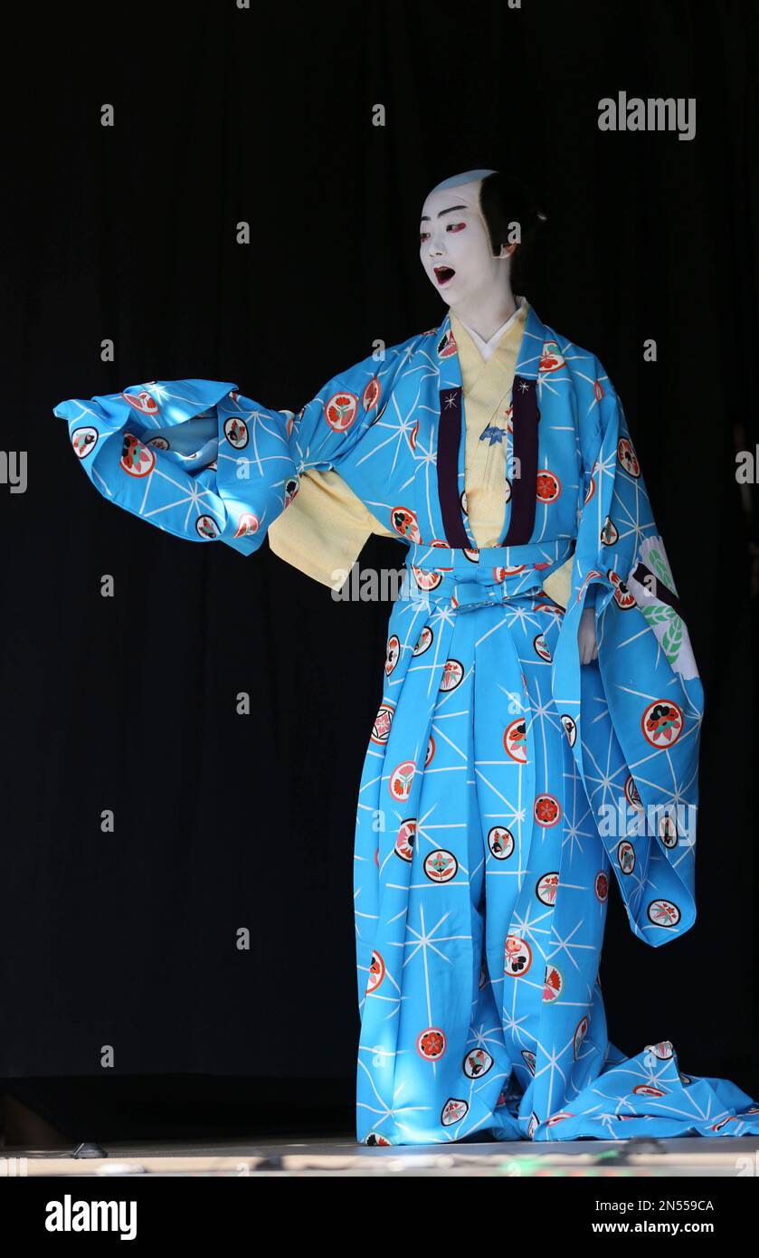 A young girl acting as a a feudal lord performs during a show of an ...