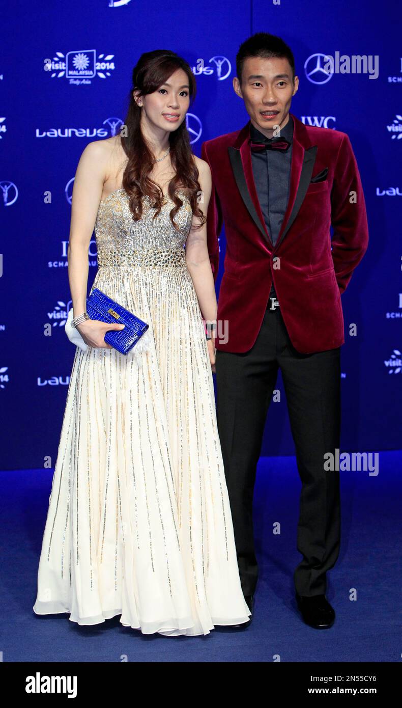 Malaysian badminton player Lee Chong Wei, right, and his wife Wong Mew ...