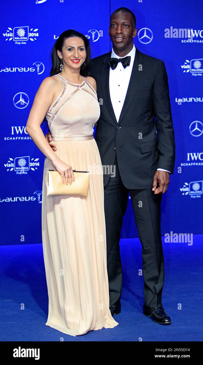 Laureus World Sports Academy member Michael Johnson, right, and his ...