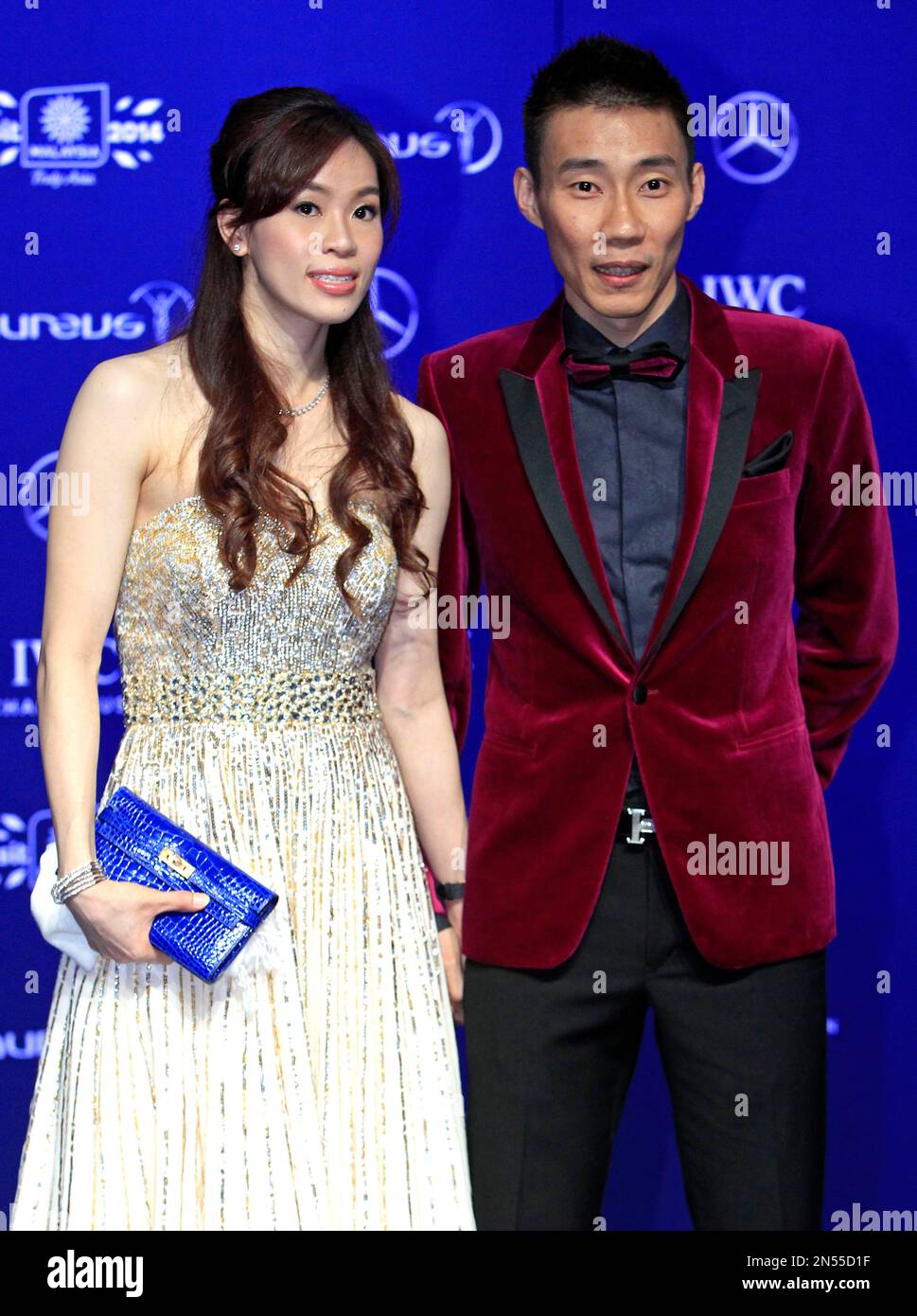 Malaysian badminton player Lee Chong Wei, right, and his wife Wong Mew ...