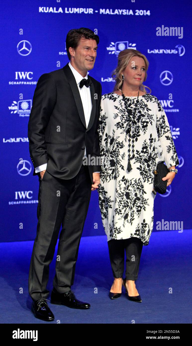 Former Danish soccer player Michael Laudrup, left, and his wife Siw ...