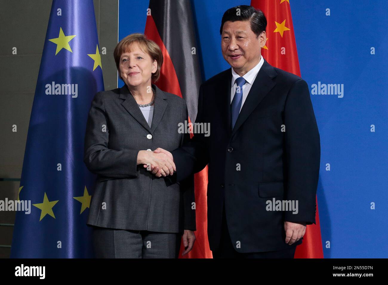 German Chancellor Angela Merkel, left, and Chinese President Xi Jinping ...