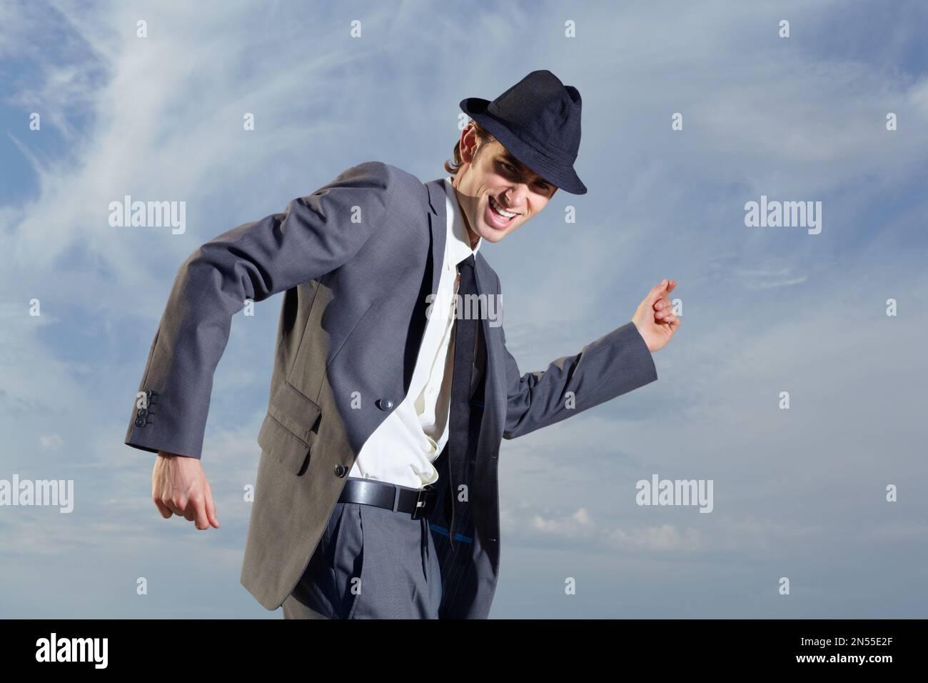 Man dancing alone in suit hi-res stock photography and images - Alamy