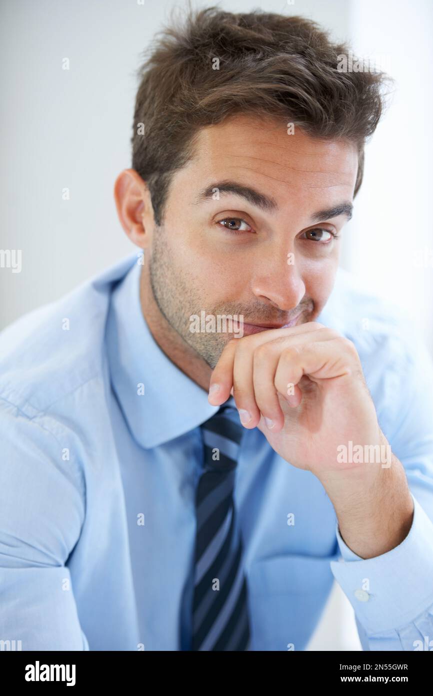 The modern professional. a handsome young businessman at work Stock ...