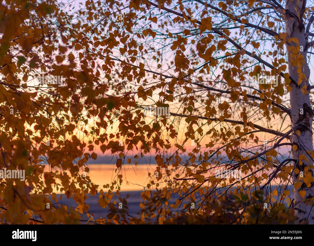 Bright colorful sunset with colorful colors on the river and the sky ...