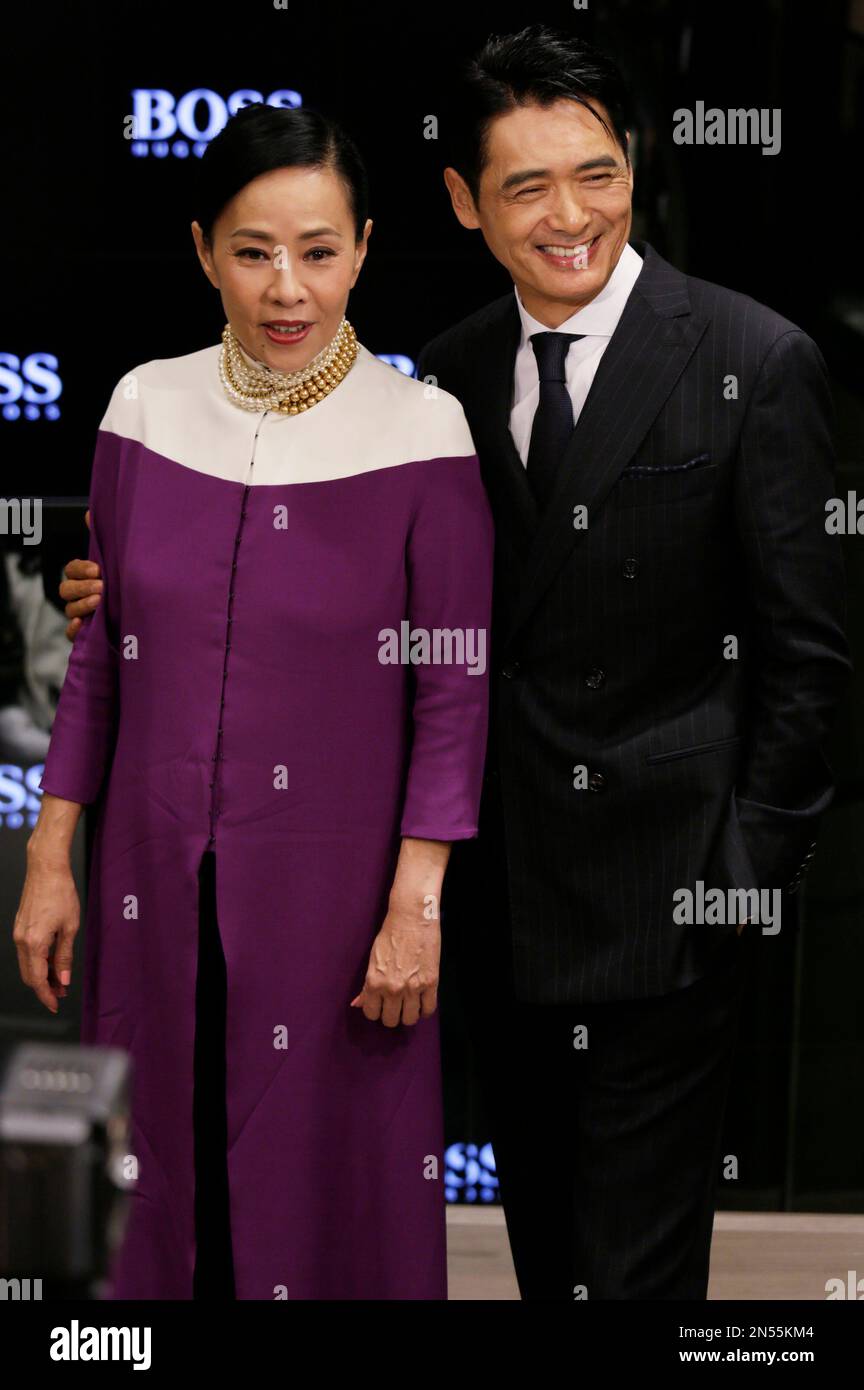 Hong Kong Actor Chow Yun Fat And His Wife Jasmine Tan Pose For Photographers During The Opening