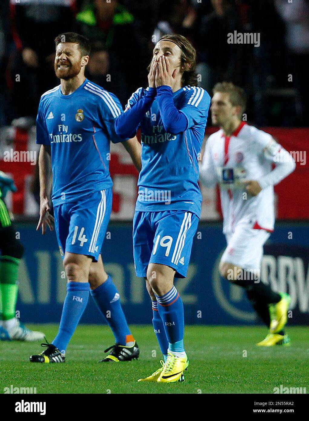 Real Madrid's Luka Modric from Croatia, right, and Xavi Alonso, left ...