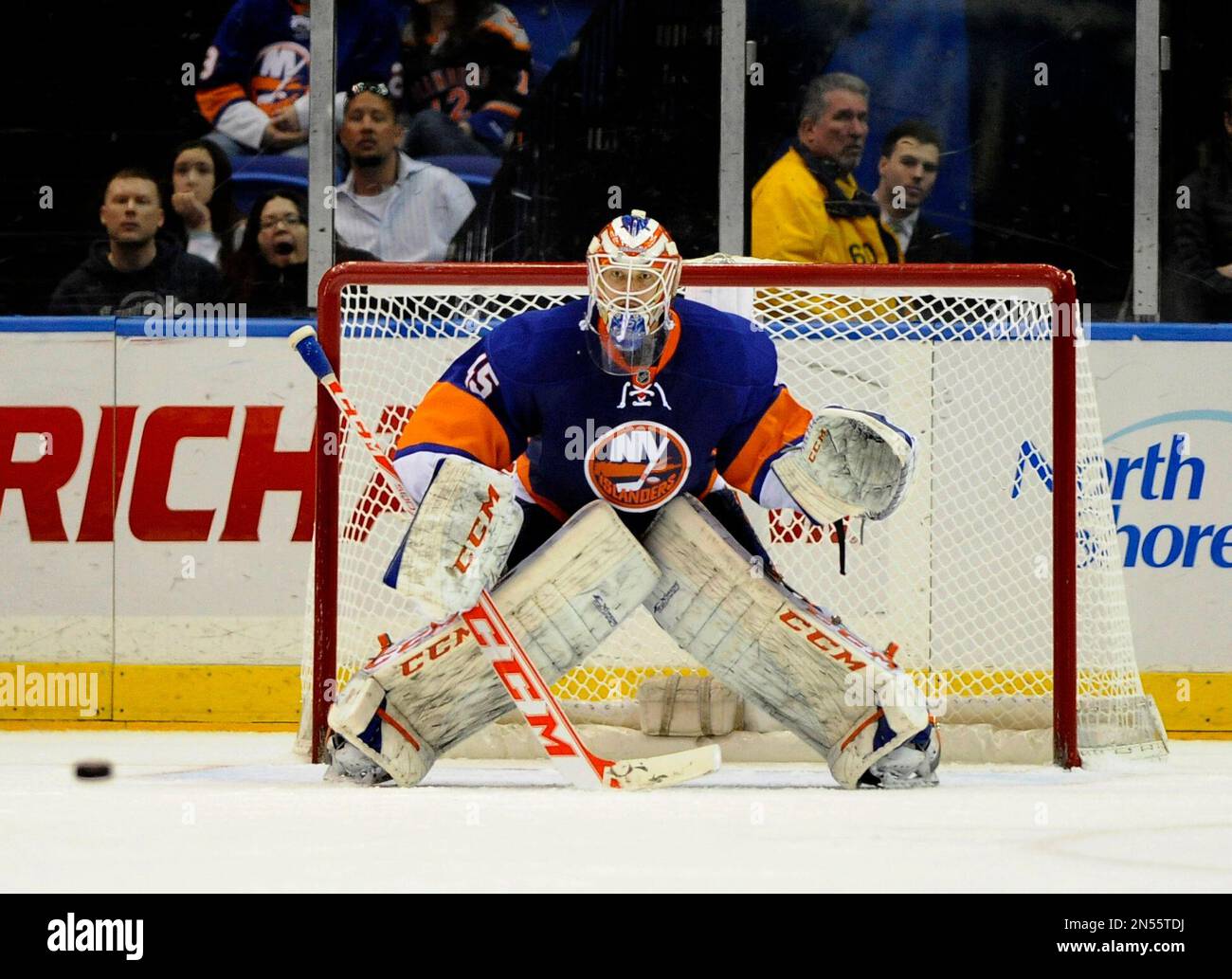 New York Islanders goalie Anders Nilsson (45) defends against the Buffalo Sabres during anNHL ...