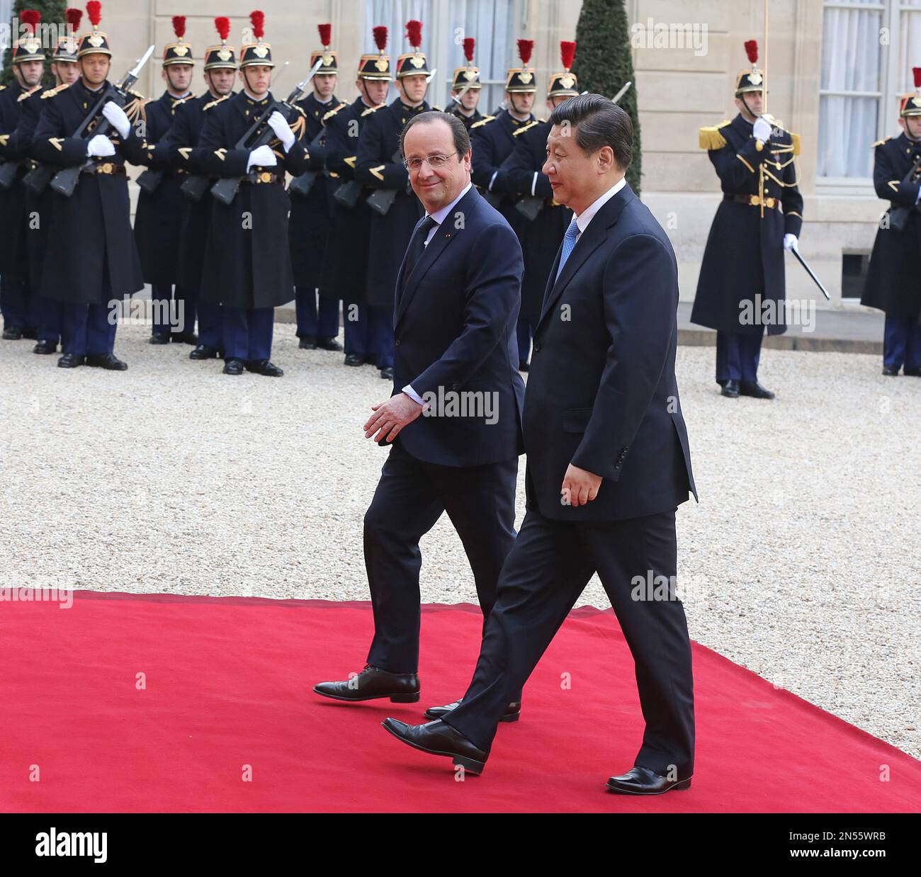 CORRECTS DATE French President Francois Hollande, centre, arrives at ...