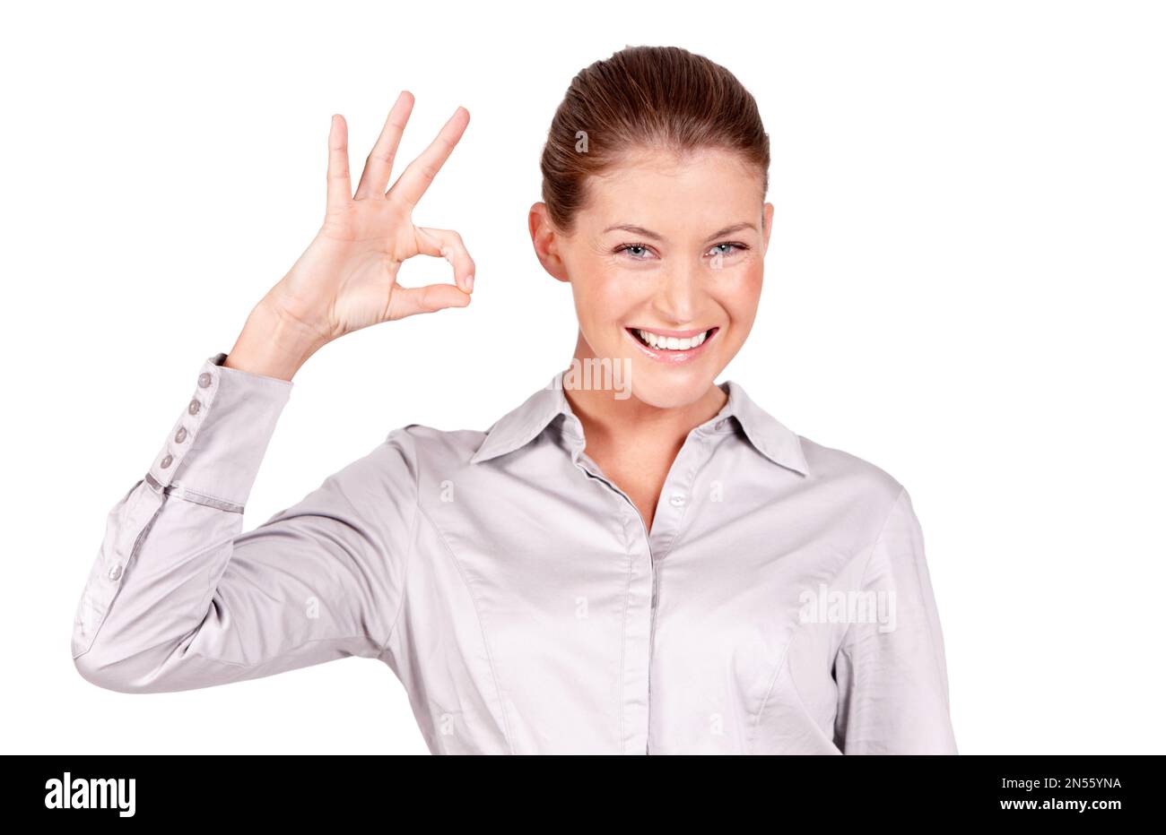 Awesome. A lovely young woman showing you the a-okay sign while ...