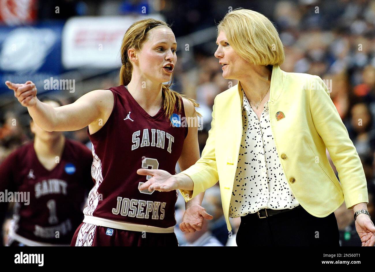 Saint Joseph's Erin Shields, left, speaks with head coach Cindy Griffin ...