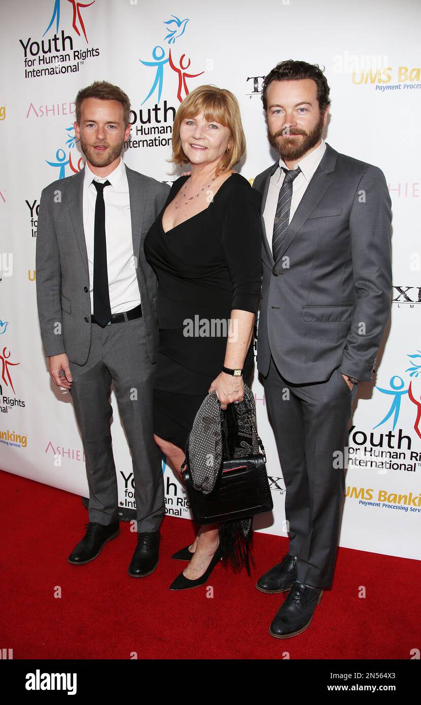 From left, Chris Masterson, Carol Masterson, and Danny Masterson arrive ...