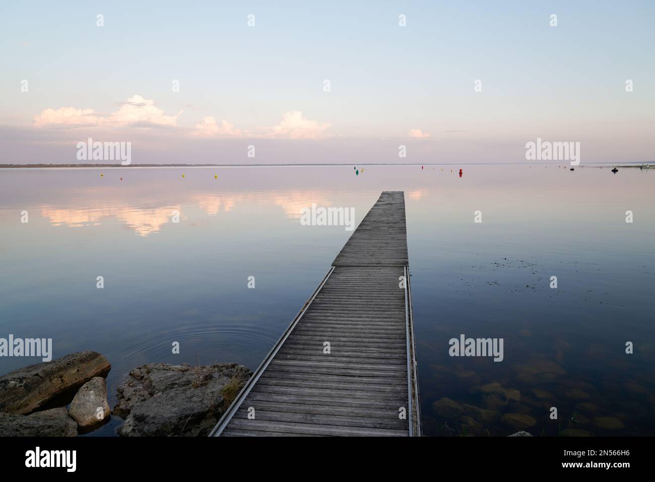 sunrise reflexion on fishing boat wooden pontoon in sunset Lake of ...