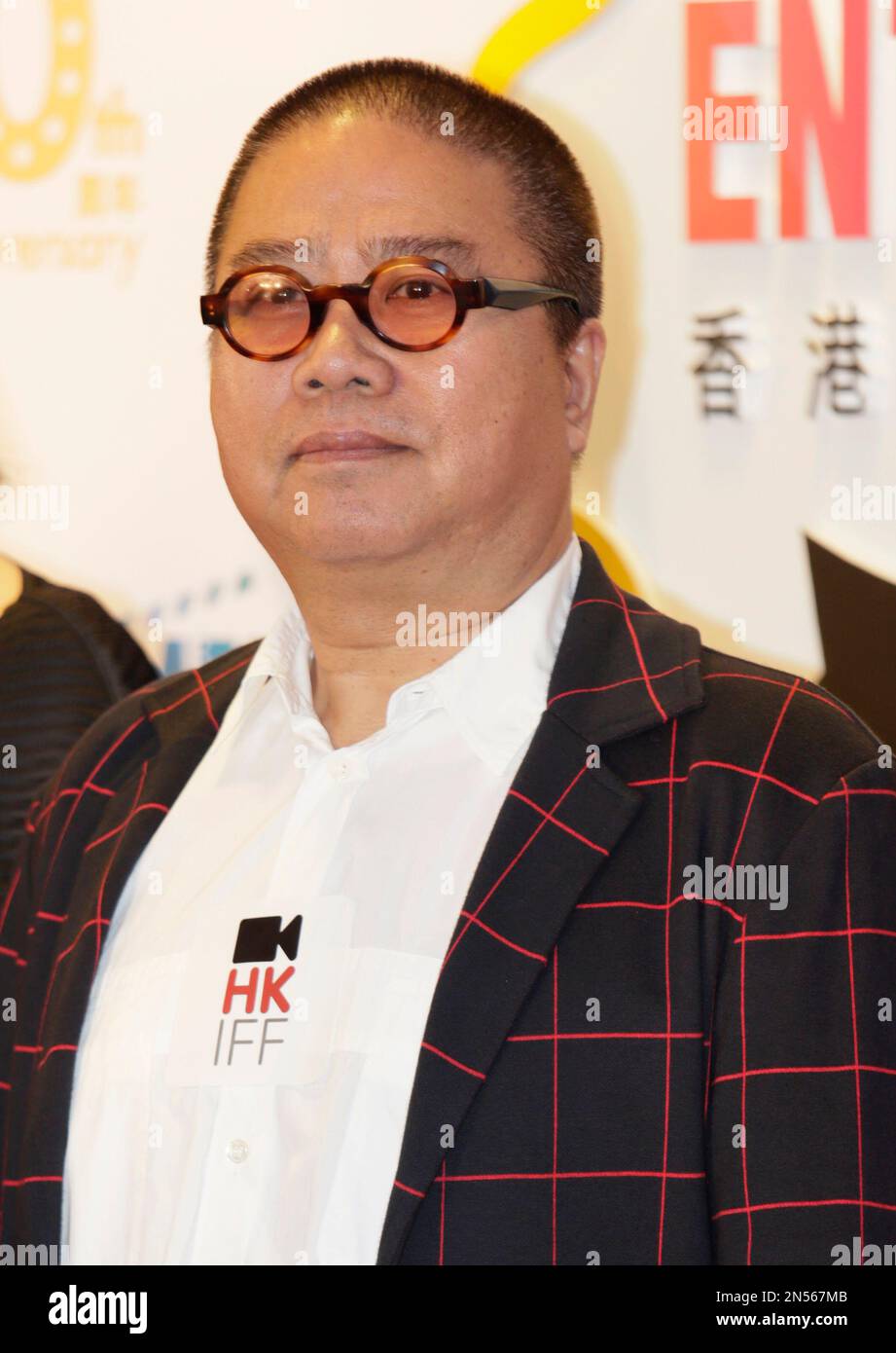 Hong Kong director Fruit Chan poses for the photographers at the red ...