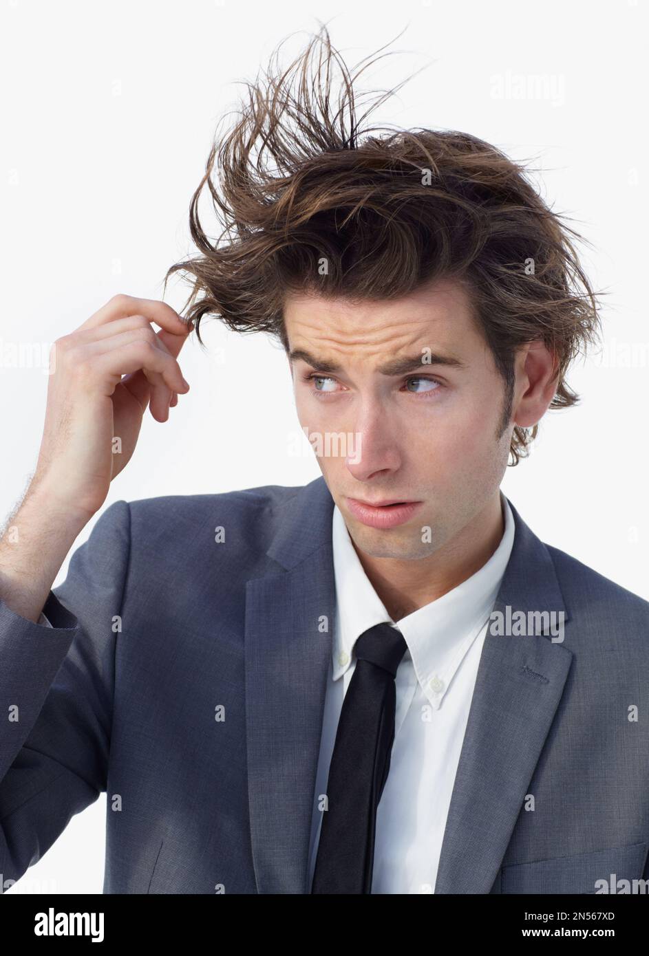 I should probably cut this...A messy and disheveled young businessman ...