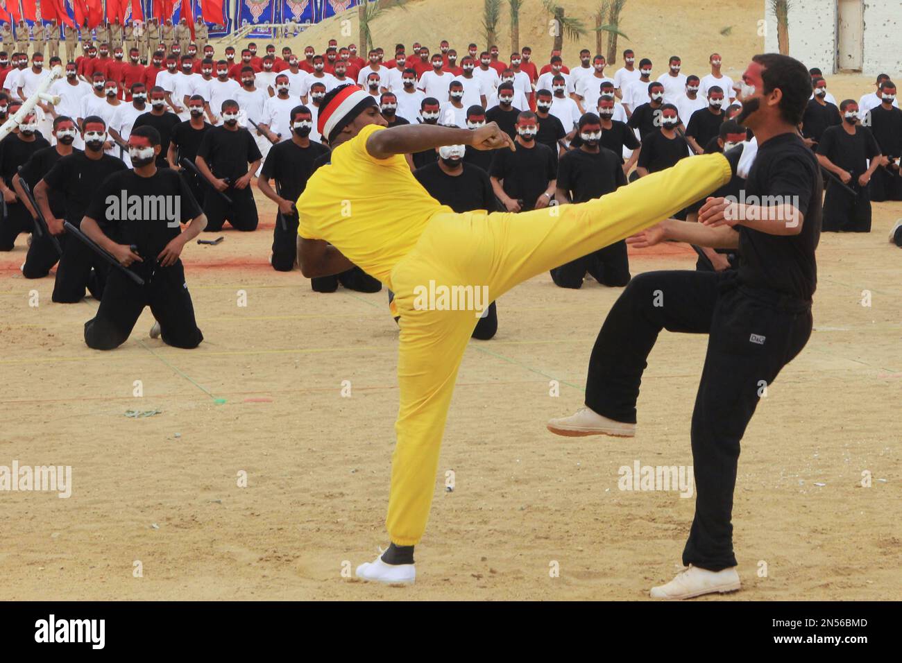 Egyptian security forces members demonstrate their skills during a ...