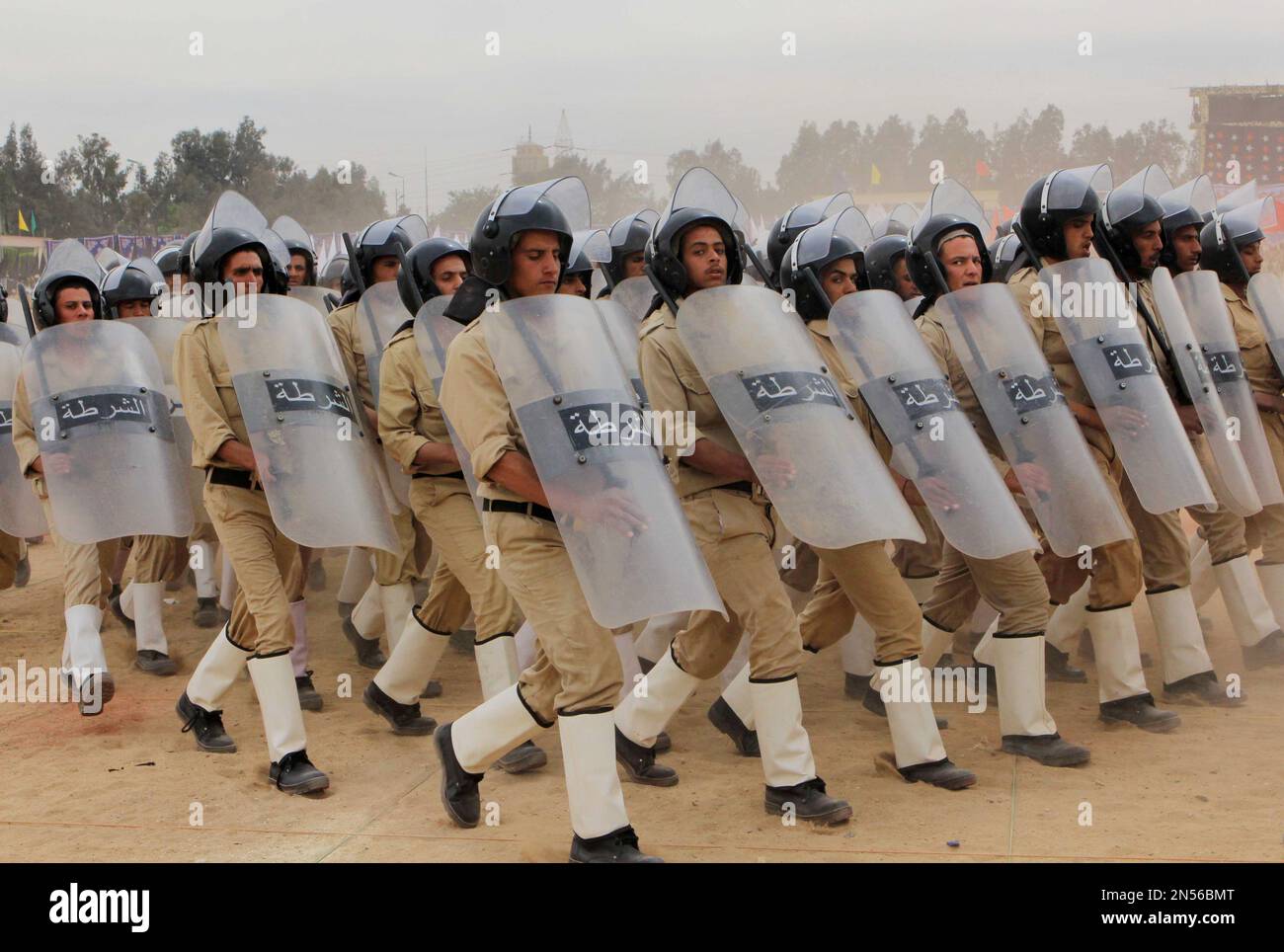 Egyptian security forces members demonstrate their formation training ...