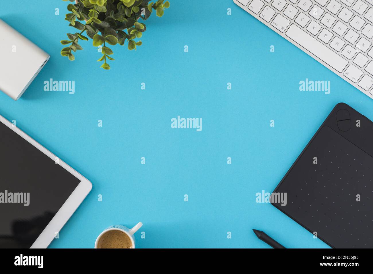 tablet with keyboard on blue table. Resolution and high quality ...