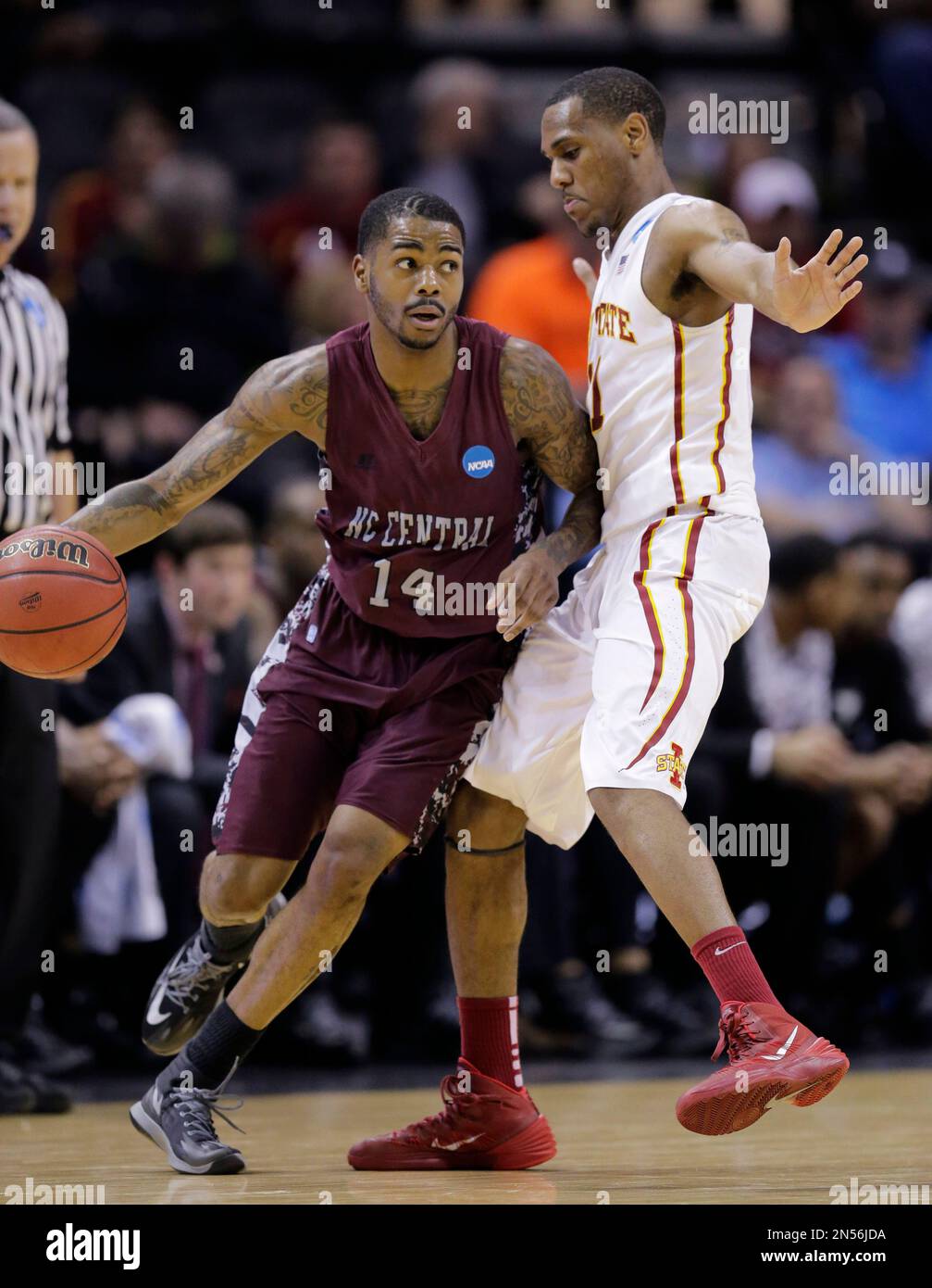 North Carolina Central's Jeremy Ingram (14) drives around Iowa State's ...
