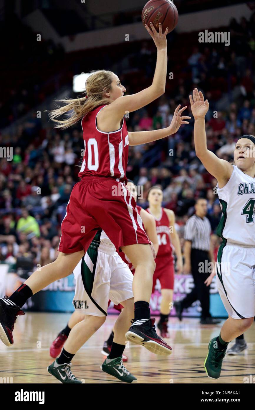 Neillsville's Jenny Linder tries to shoot over the defense of Kettle ...
