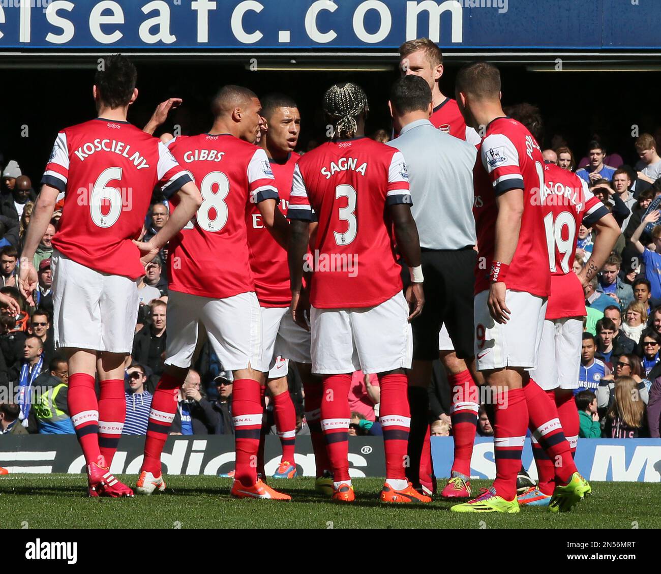 Arsenal's Kieran Gibbs,second left and teammate Alex Oxlade-Chamberlain ...