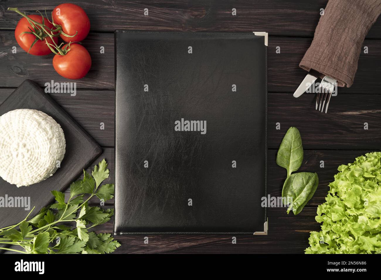 top view empty menu book with tomatoes cutlery. Resolution and high ...