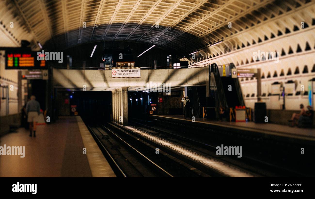 Inside the Metro Center Station in Washington DC. People walking along ...