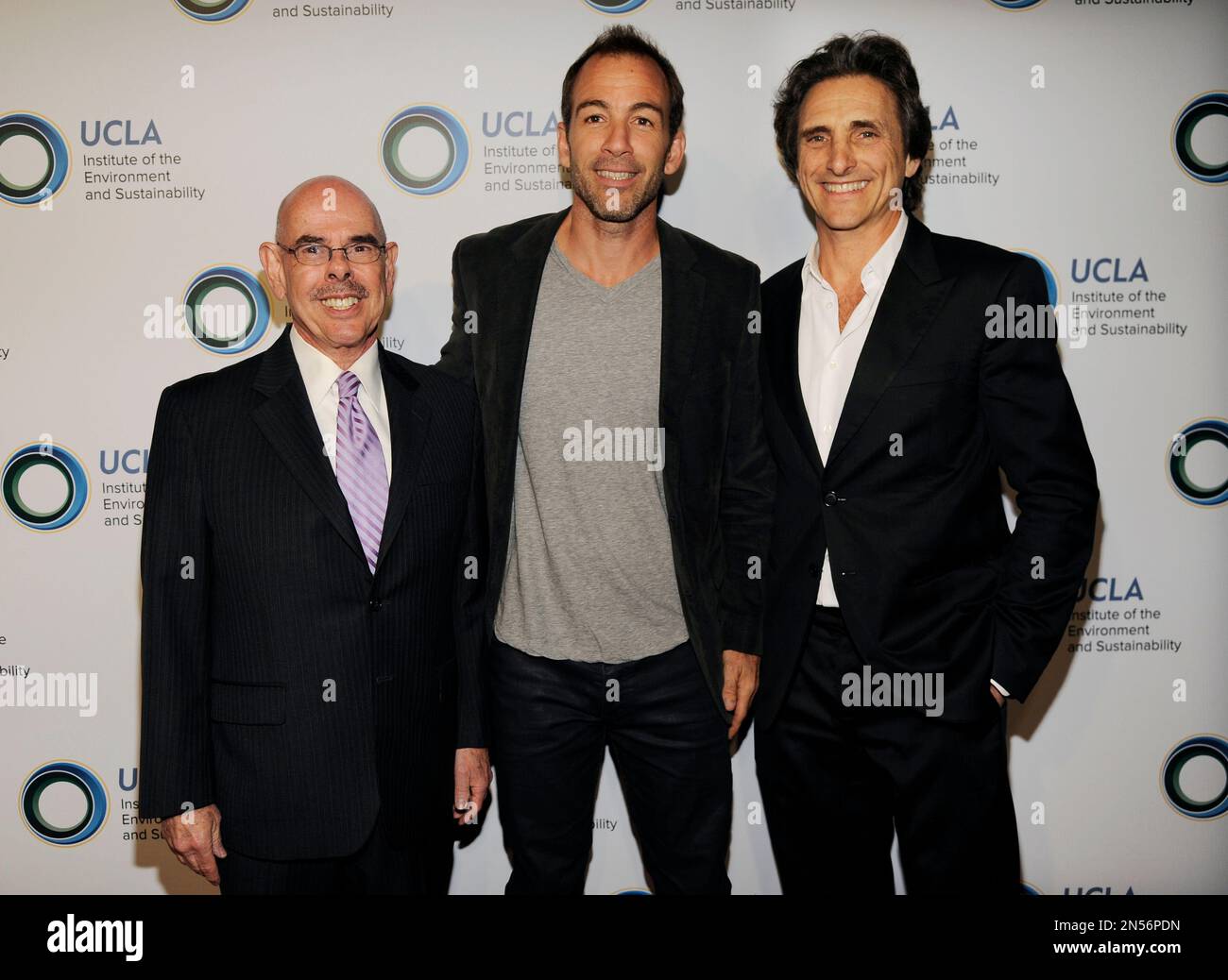 U.S. Rep. Henry Waxman, left, actor Bryan Callen, center, and producer Lawrence Bender pose ...