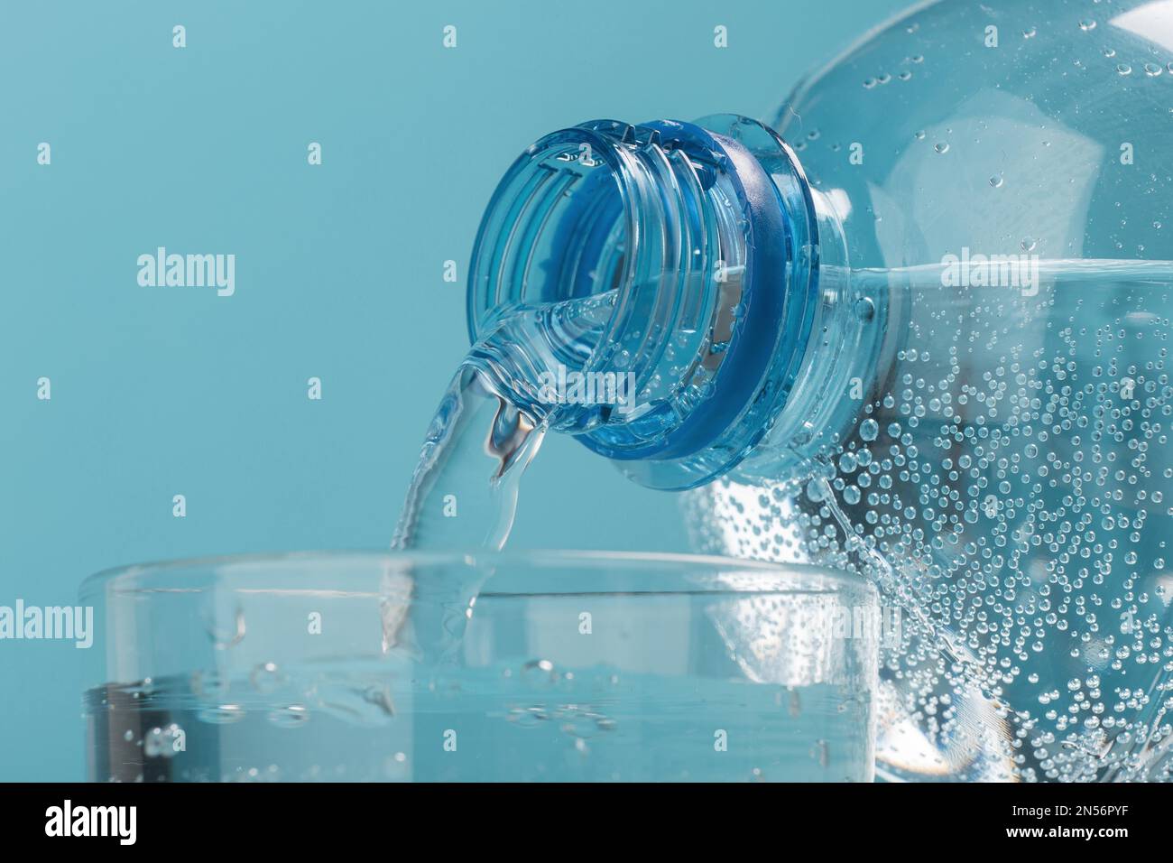 Pouring water in glass container hi-res stock photography and images ...
