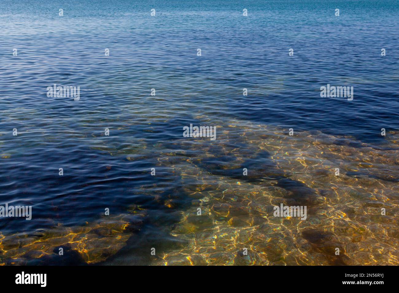 Background image - sea water with soft waves and reefs Stock Photo - Alamy