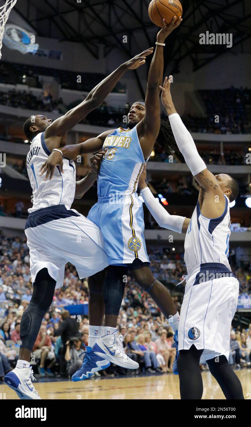 Denver Nuggets forward Kenneth Faried (35) shoots between Dallas ...