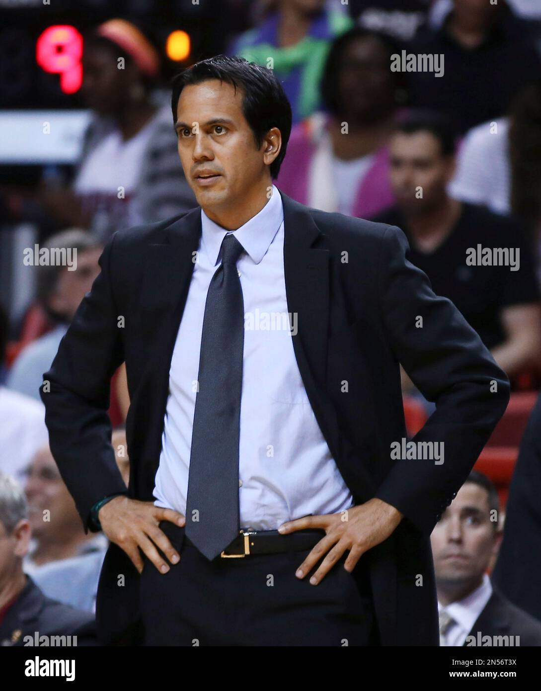 Miami Heat coach Erik Spoelstra watches during the first half of an NBA ...